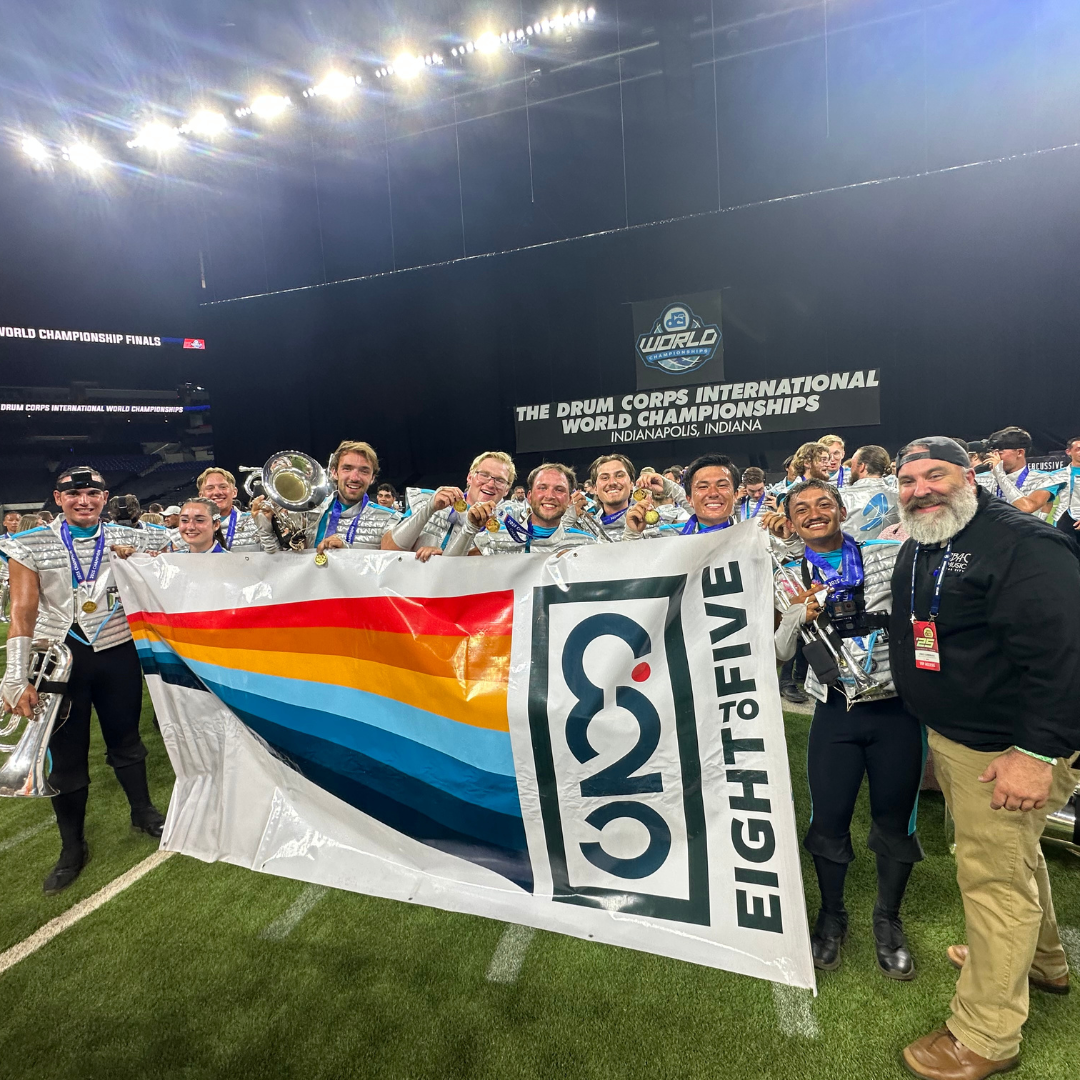 Outdoor stadium drum corps hornline during evening finals
